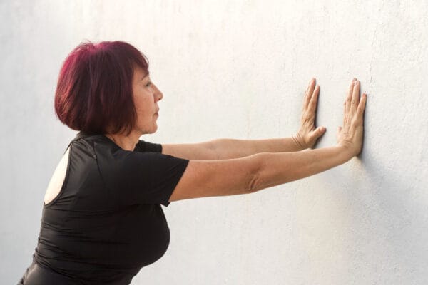 I Did These 6 Wall Exercises Every Morning—My Rounded Shoulders Are Gone